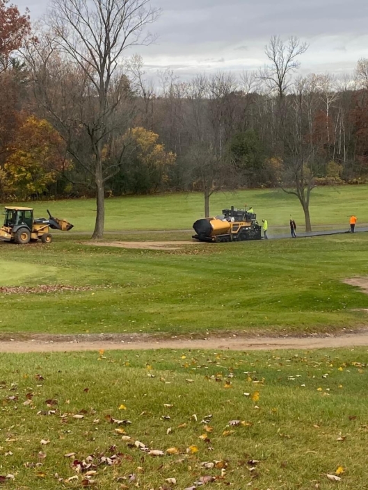 Couple cart paths are getting paved today!! - Shamrock Heights