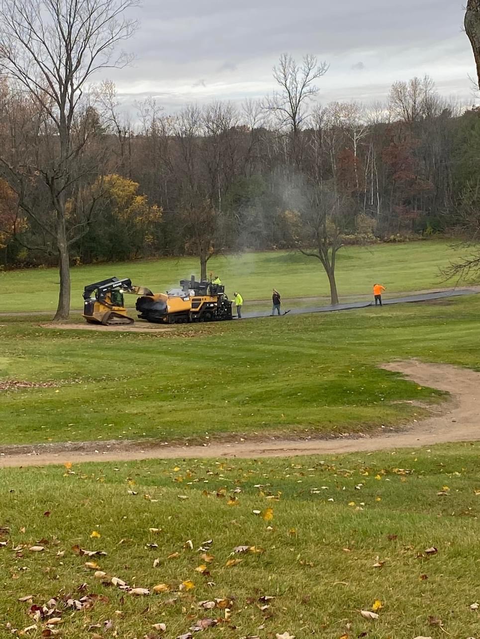 Couple cart paths are getting paved today!! - Shamrock Heights